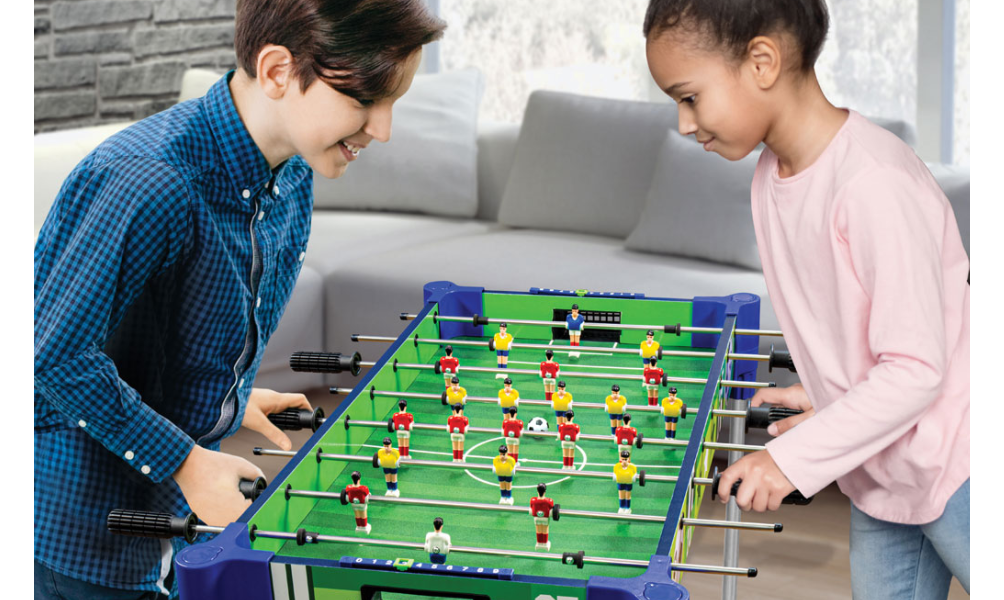 Family Playing Foosball